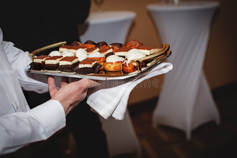 Waiter with desserts stock image. Image of idea, expertise - 65726613