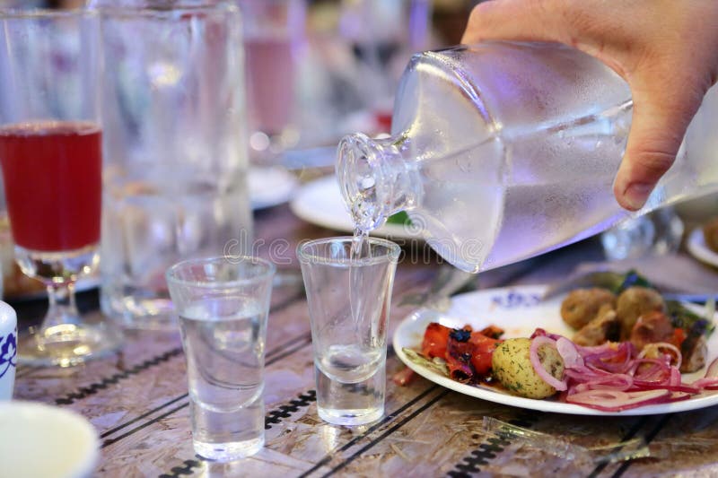 Waiter filling vodka stock photo. Image of meal, barkeeper - 55200016