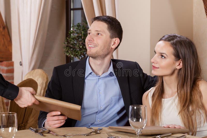 Waiter giving menu stock photo. Image of love, cheerful - 39902582