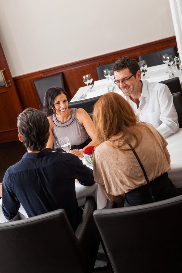 Waiter Happily Accommodating Couple Stock Image - Image of eating, club ...
