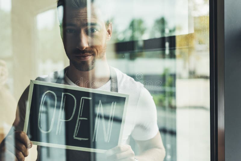 Waiter Holding Chalkboard with Open Word Stock Photo - Image of ...