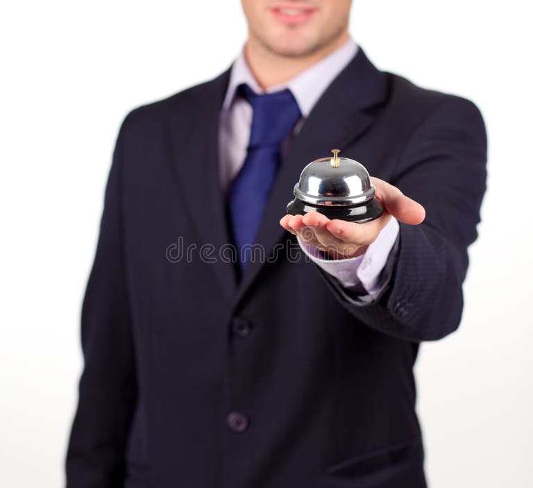 Waiter Holding a Hotel Bell Stock Photo - Image of metaphor, arrive ...