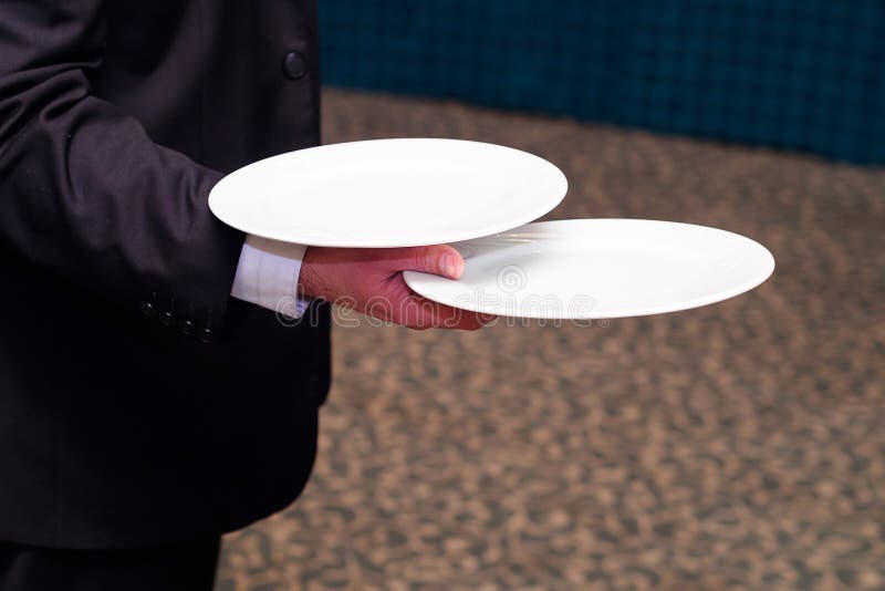 Butler with Plates stock image. Image of formal, cater - 7691123