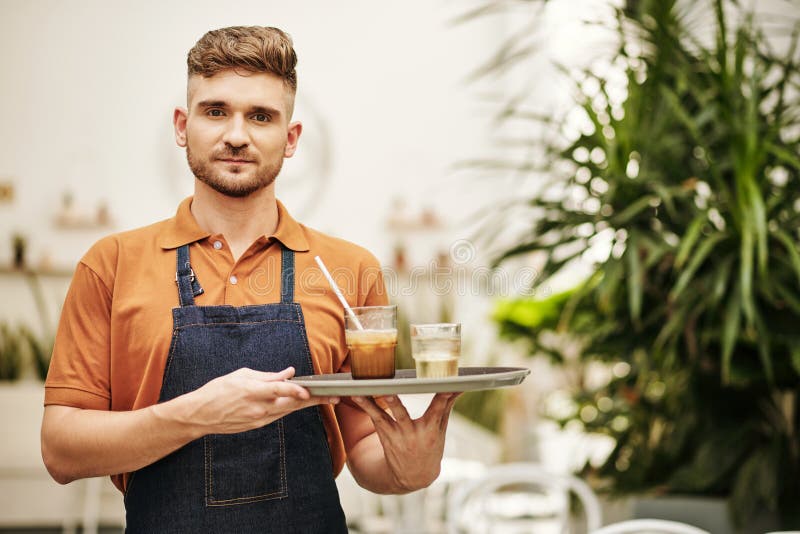 Waiter Holding Tray with Drinks Stock Photo - Image of coffee, smiling ...