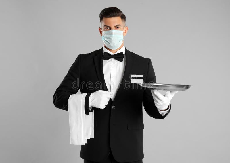 Waiter in Medical Face Mask with Empty Tray on Light Grey Background ...