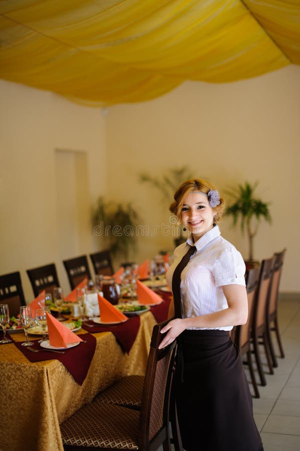 Waiter Near the Table with Food Stock Image - Image of serving, smile ...