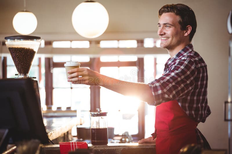 Waiter Offering a Cup of Coffee Stock Image - Image of standing, people ...