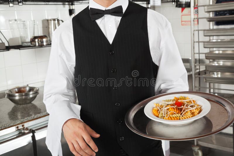 Waiter And Chef Using Digital Tablet In Kitchen Stock Photo - Image of ...