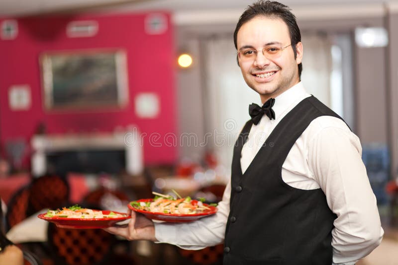 Greek waiter with lobster stock photo. Image of waiter - 5353172
