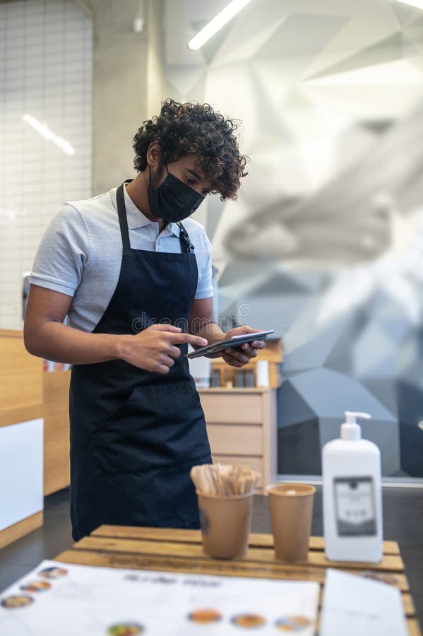 Waiter in Protective Mask Getting Onlibe Orders for Food Delivery Stock ...