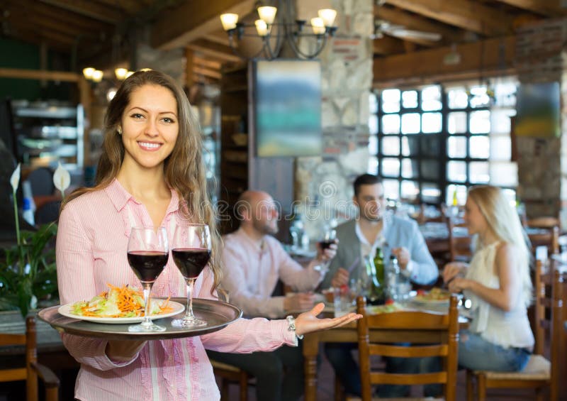 Waiter with Restaurant Guests at Table Stock Image - Image of glasses ...