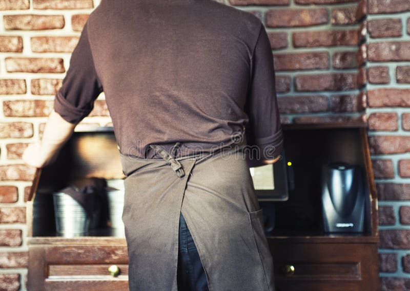 Waiter at Restaurant Processes the Account. Stock Photo - Image of ...