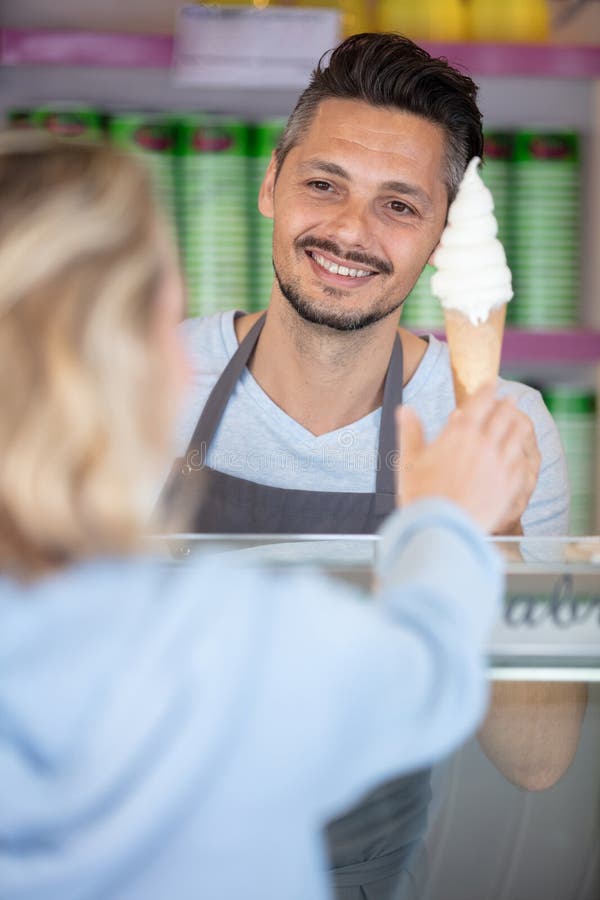 Waiter Selling Ice Cream Cup at Parlor Stock Photo - Image of parlor ...