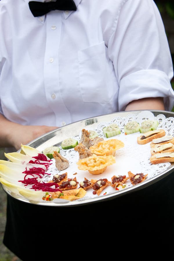 A Waiter Serving Appetizers at a Wedding Stock Image - Image of waiter ...