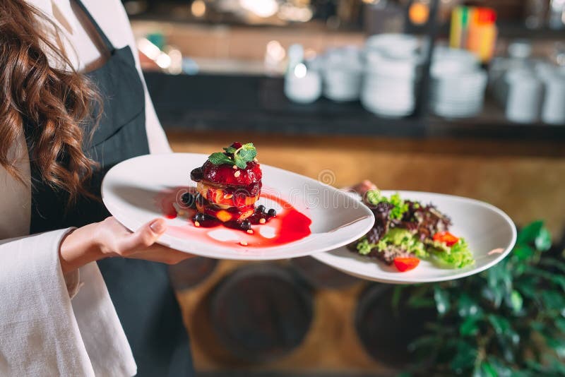 Waiter Serving in Motion on Duty in Restaurant. the Waiter Carries ...