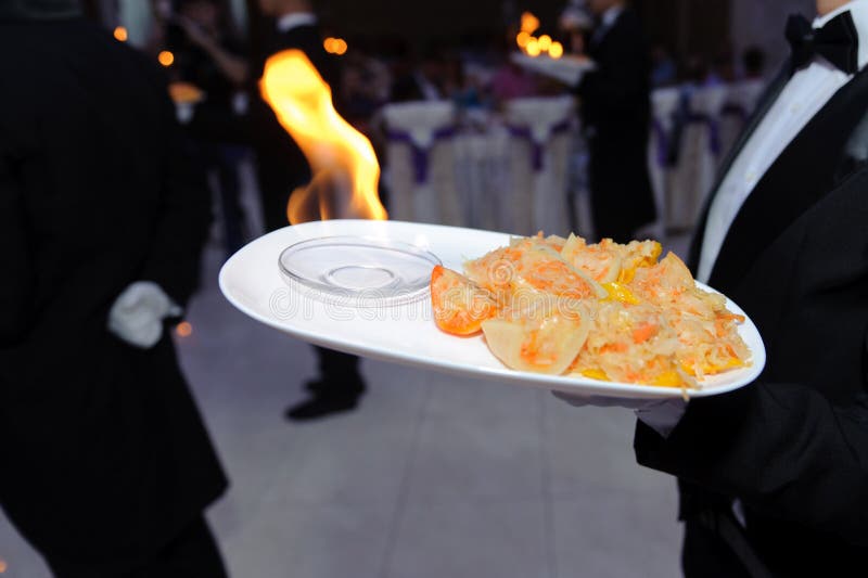 Waiter Serving Plate with Fire Stock Photo - Image of food, dining ...