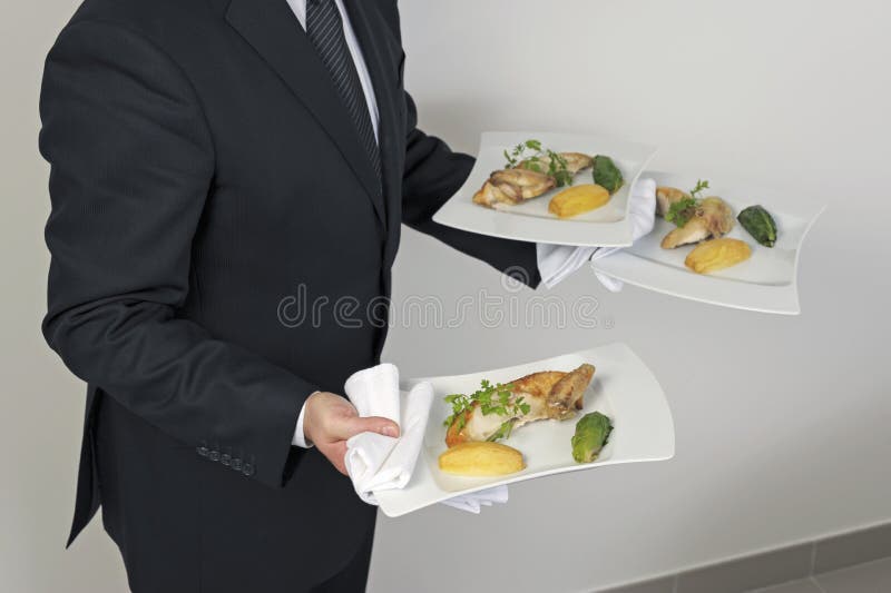 Waiter Serving Plates of Food Stock Image - Image of serve, meat: 23707573