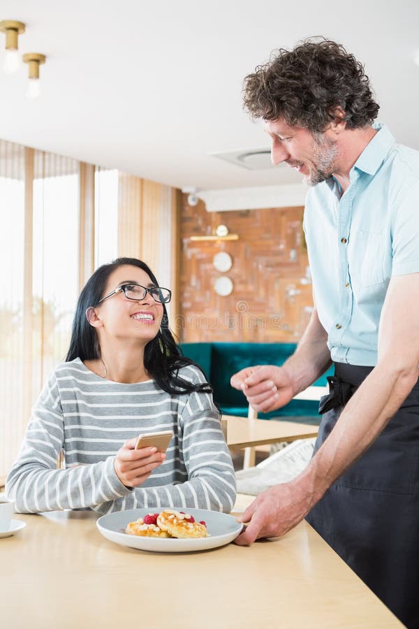 Waiter Serving Snack To Customer Stock Image - Image of customer ...