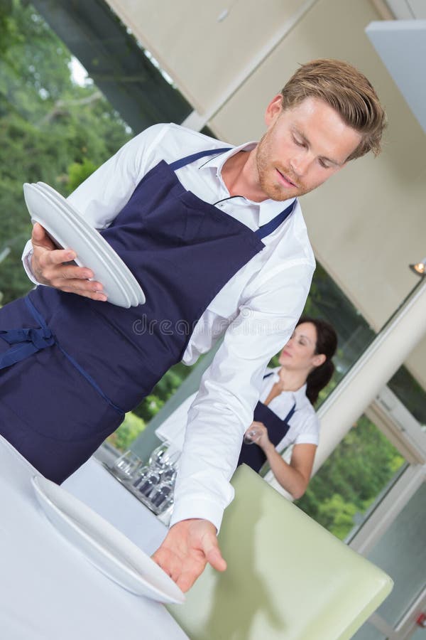 Restaurant Waitress Giving Menu To Customers Stock Image - Image of ...