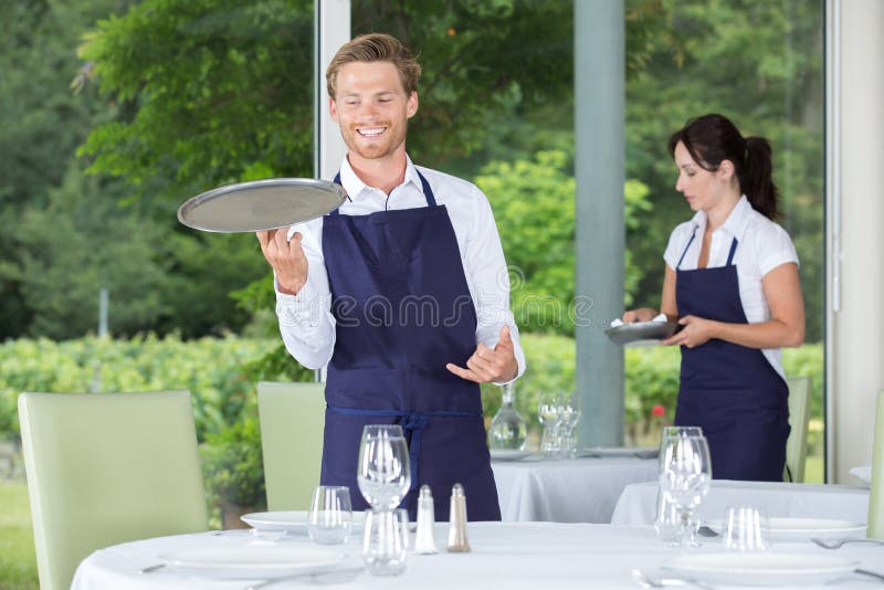 Waiter Setting Present on Plate Stock Image - Image of christmas, place ...