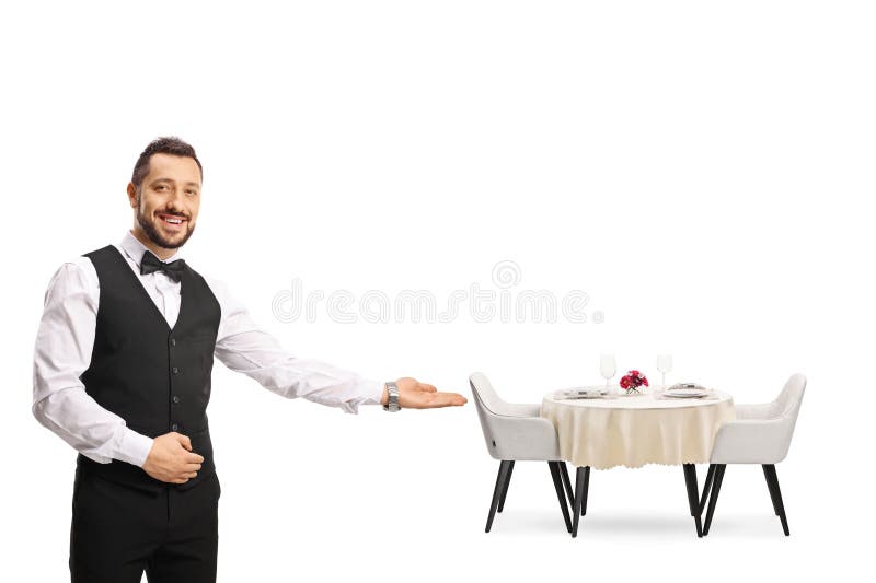 Waiter Smiling and Gesturing Welcome into a Restaurant Stock Image ...