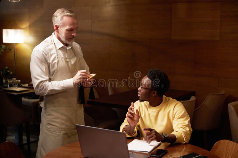 Waiter Taking Order from Customer in Restaurant Stock Image - Image of ...