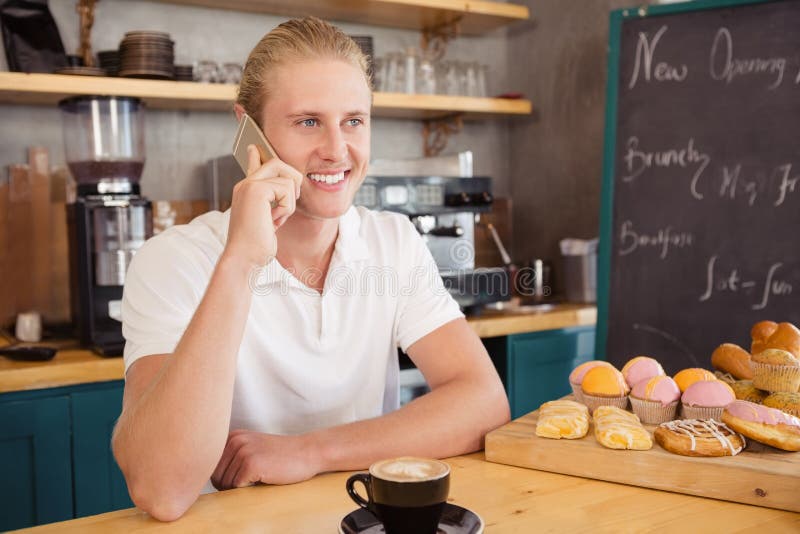 Waiter Talking on Mobile Phone Stock Photo - Image of muffin, adult ...