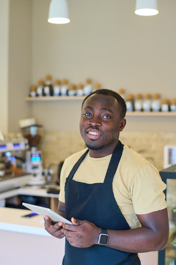 Waiter Using Tablet Pc at Work Stock Photo - Image of online ...