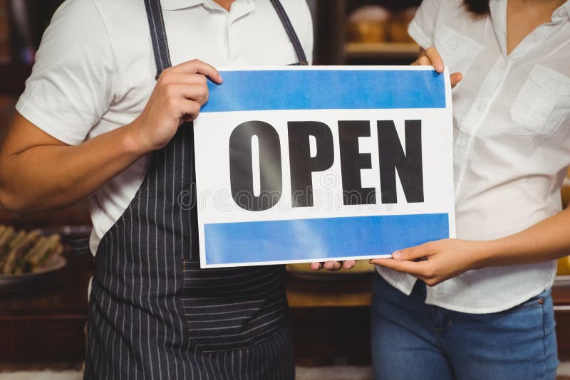 Waiter and Waitress Posing with Open Sign Stock Photo - Image of open ...