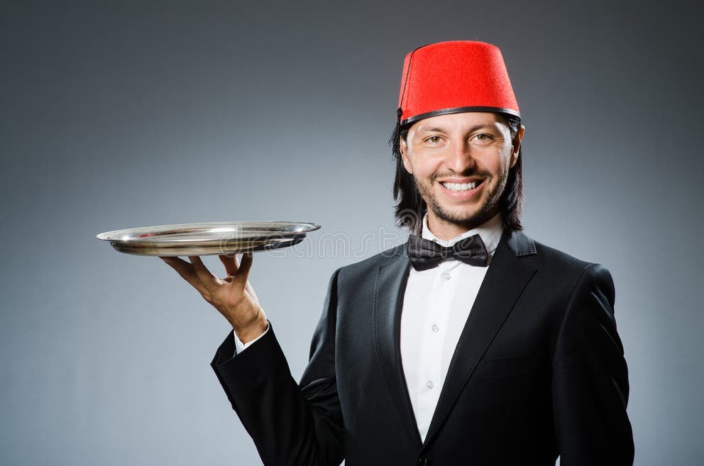 Waiter wearing traditional stock image. Image of male - 45061825