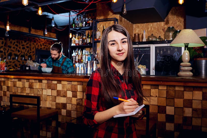 A Waiter Worker Girl Takes an Order in Cafe Bar Stock Photo - Image of ...