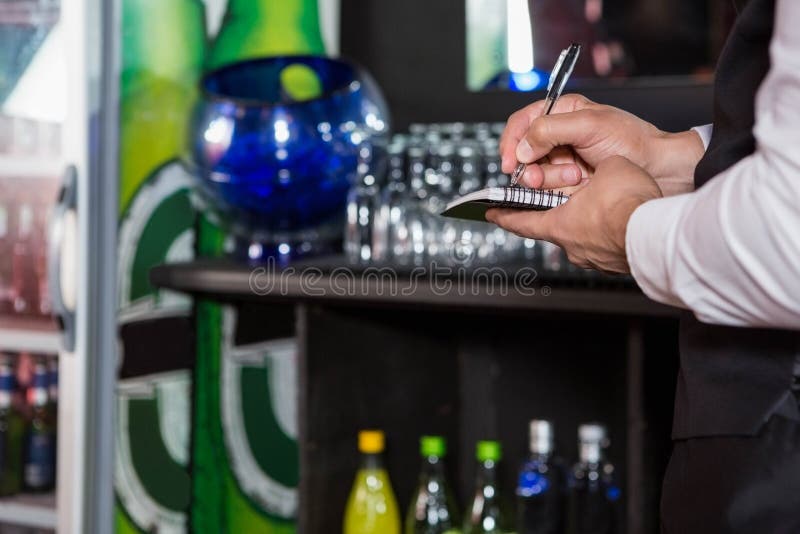 Waiter Writing Down an Order Stock Photo - Image of focus, waiter: 67547414