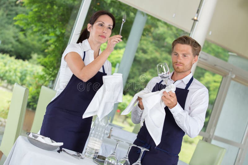 2 Waiters Setting Up Restaurant Tables Stock Photo - Image of people ...