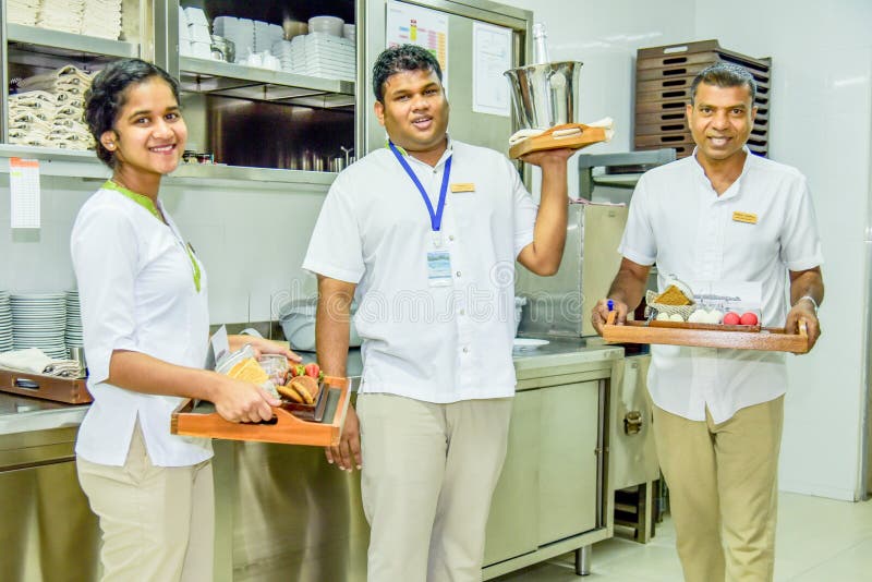 Waiters and Waitress Team with Trays in the Kitchen Editorial Stock ...