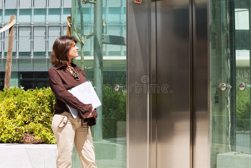 Waiting for the elevator stock image. Image of move, looking - 35609943