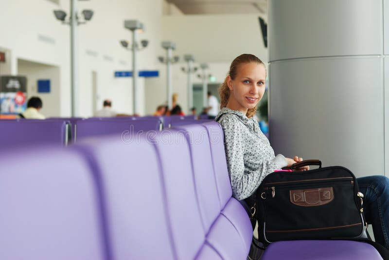 Waiting for a flight stock photo. Image of vacation, female - 7218764