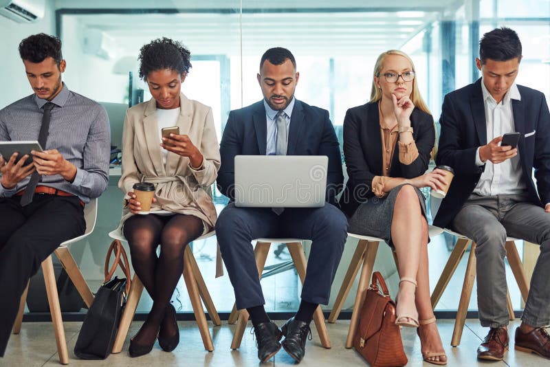 The Waiting Game at Its Best. a Group of Focussed Young Businesspeople ...