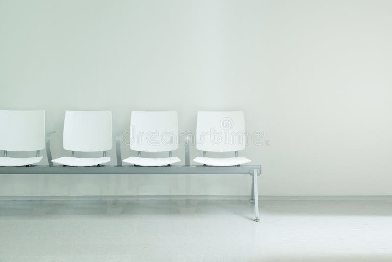 Waiting Hall Chairs Forming a Row Against a White Wall Background Stock ...