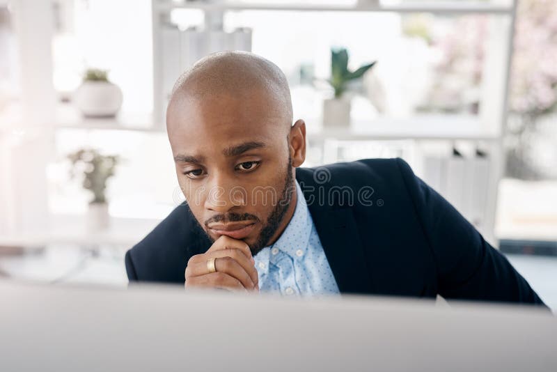 Waiting for Inspiration To Strike. a Young Businessman Staring at His ...