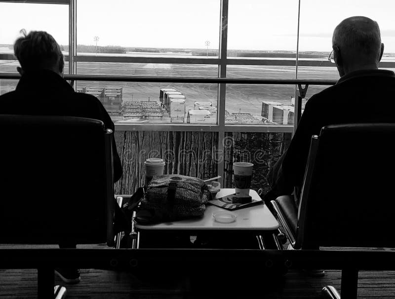 Waiting Patiently at the Airport Passing the Time Editorial Stock Photo ...