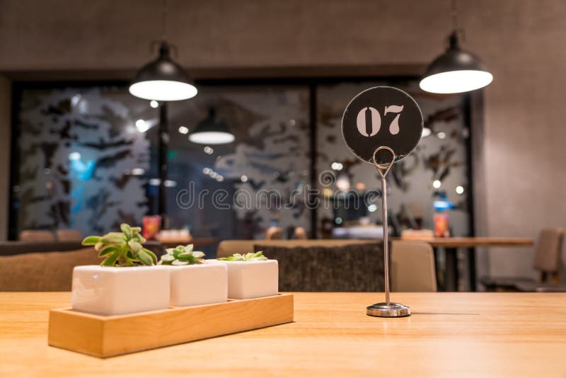 Waiting Queues Tag of the Restaurant on the Wooden Table Stock Photo ...