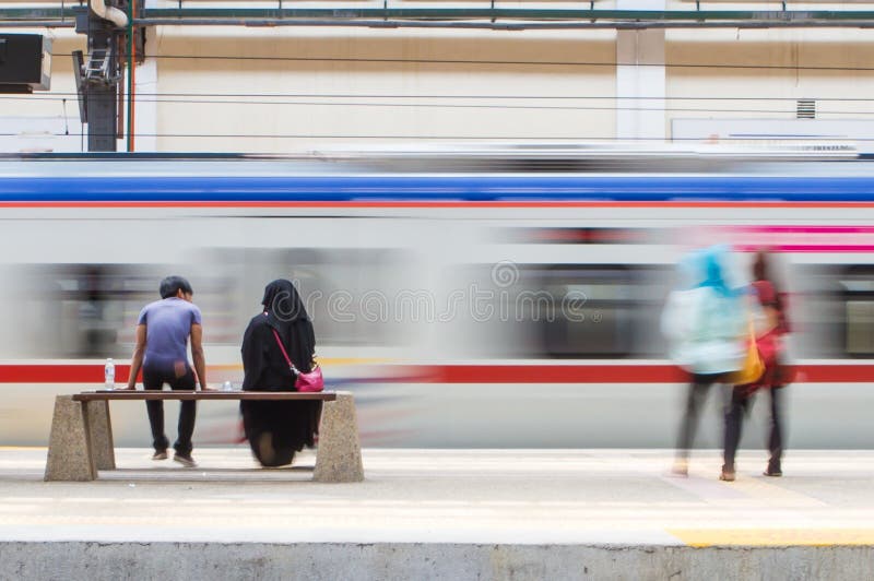 Waiting at the Railway Station Stock Photo - Image of burqua, holiday ...