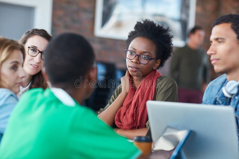 Waiting for Some Direction. a Group of University Students Working on a ...