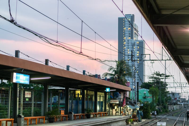 Waiting for the Train at Sunset in a Suburban Station in Java ...