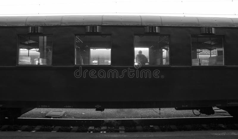 Waiting Vintage Train Coach with a Man Looking Out of a Window Stock ...