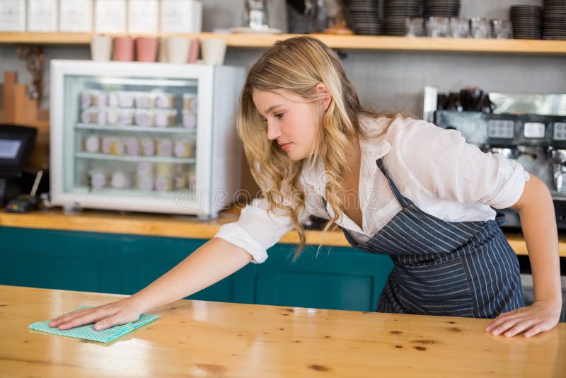 Waitress Cleaning the Table in Restaurant Stock Image - Image of ...