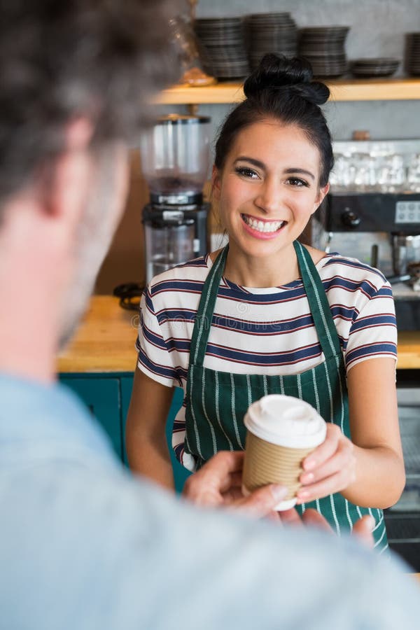 Waitress Giving Cup of Coffee To Customer Stock Photo - Image of ...
