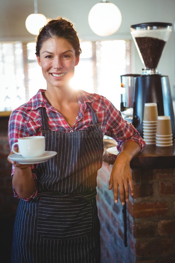 Waitress Holding a Cup of Coffee Stock Photo - Image of barista, female ...