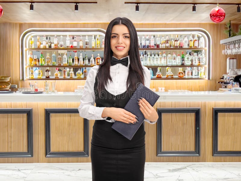 Waitress Holding a Menu and Standing at a Bar Stock Photo - Image of ...