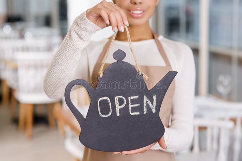 Waitress Holding an Opening Sign Stock Photo - Image of cafe, bakery ...
